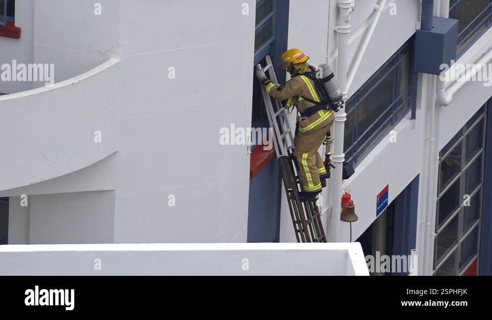 Firefighter at work climbing on ladder Stock Videos & Footage - HD and ...