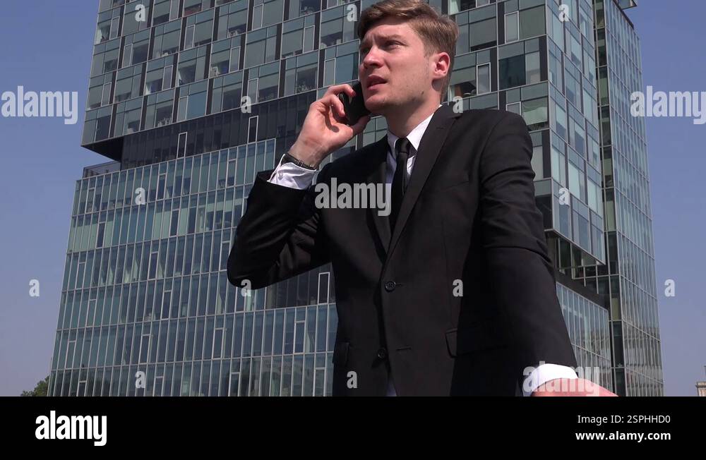 Angry nervous scolding business man salesman outside yelling on mobile ...