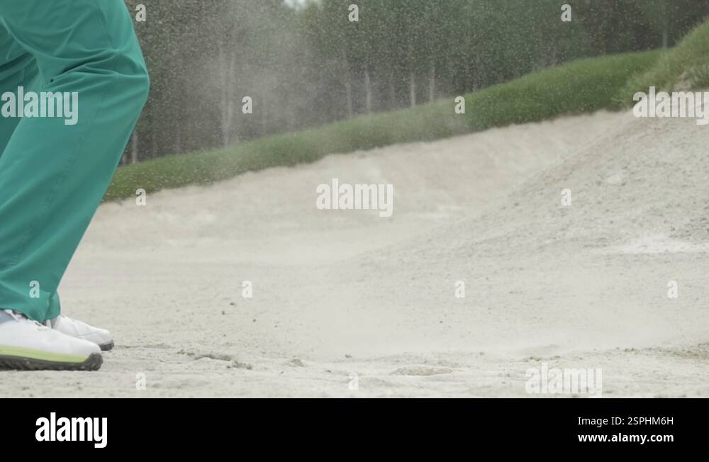 Golf shot in sand. Golf player hits a ball in the sand. Sand trap play ...