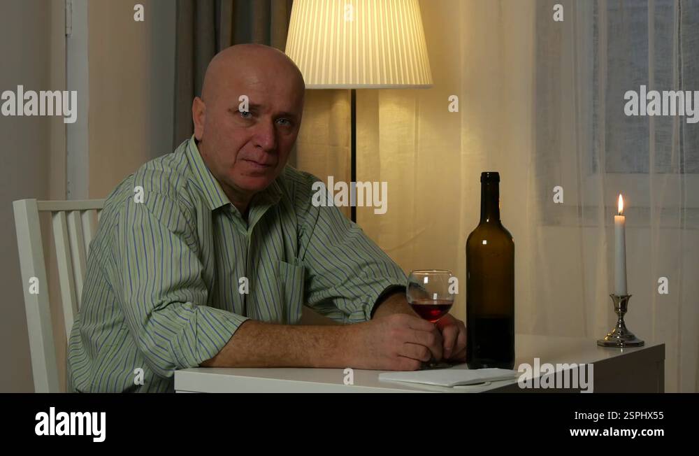 Bored Person on Table in Restaurant Stay with a Glass of Wine in Hand ...