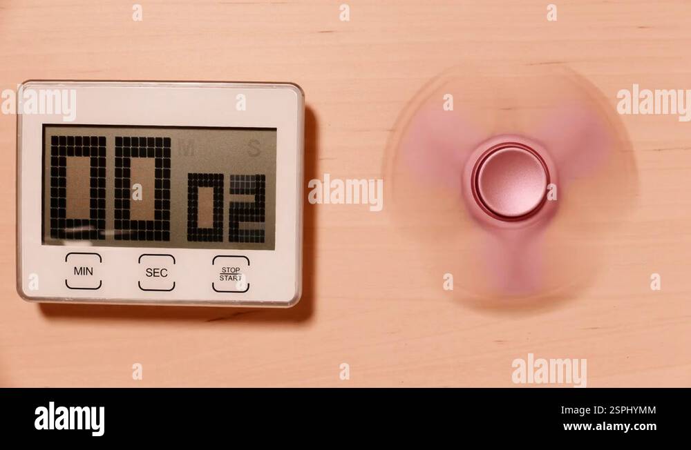 Timer countdown and fidget spinner toy is rotating 4K Stock Video ...