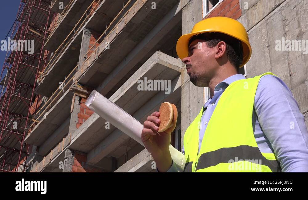 Architect with blueprint eating lunch engineer workman enjoy burger ...