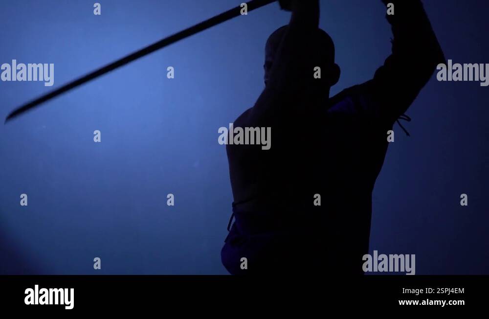 Bald Ninja in a mask fights in the dark, slow motion Stock Video ...