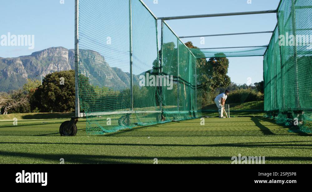 Cricket players practicing in the nets during a practice session Stock ...