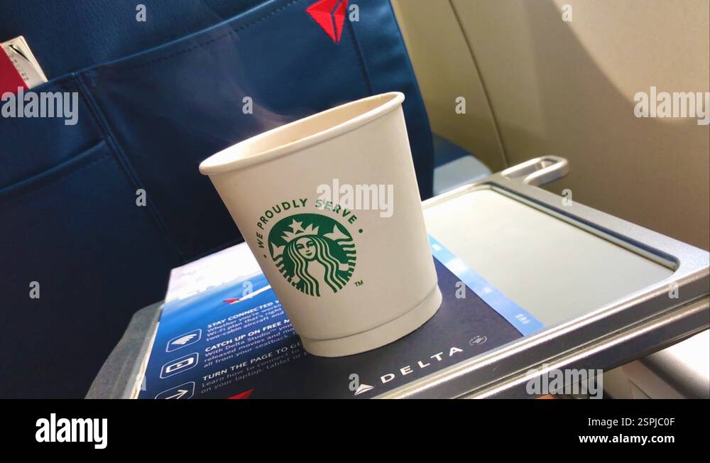 Delta Airlines Inflight Steaming Cup of Starbucks Coffee Stock Video ...
