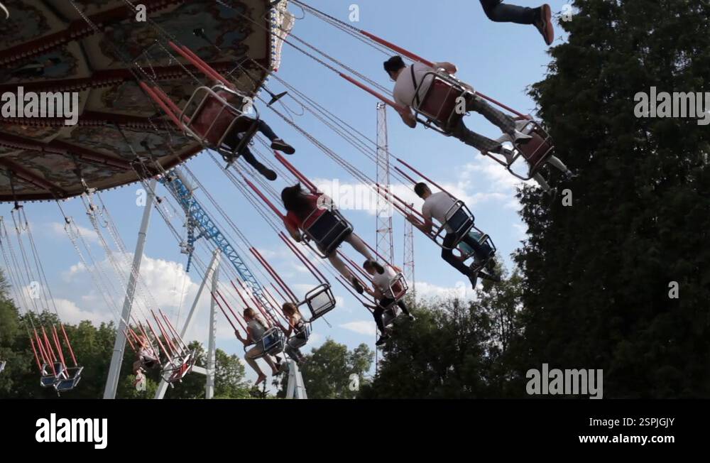 Amusement Park, People Ride the Carousel Stock Video Footage - Alamy