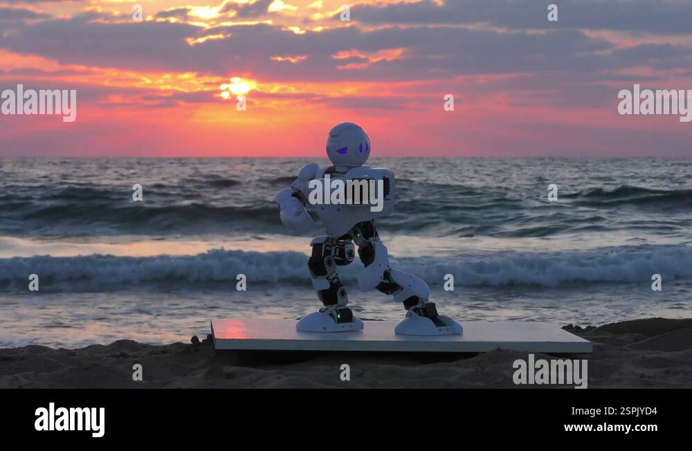 Humanoid autonomous smart robot relaxing with Tai Chi on the beach ...