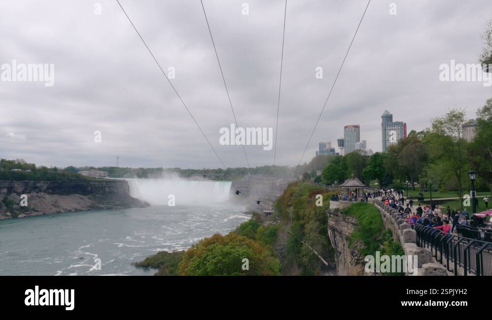 Niagara Falls, Zip Line Riders, and Throngs of Tourists Stock Video ...