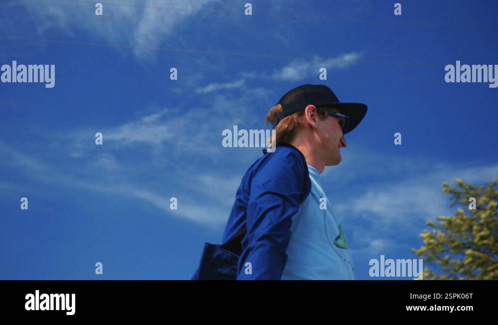 Young lovers couple walking in the field and kissing. Feel happy. The ...