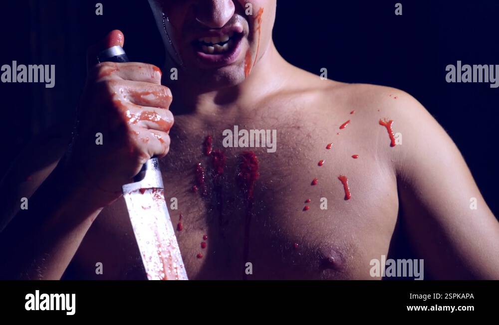 A mad man, a gripping knife, covered in blood, the hands of a ruthless ...