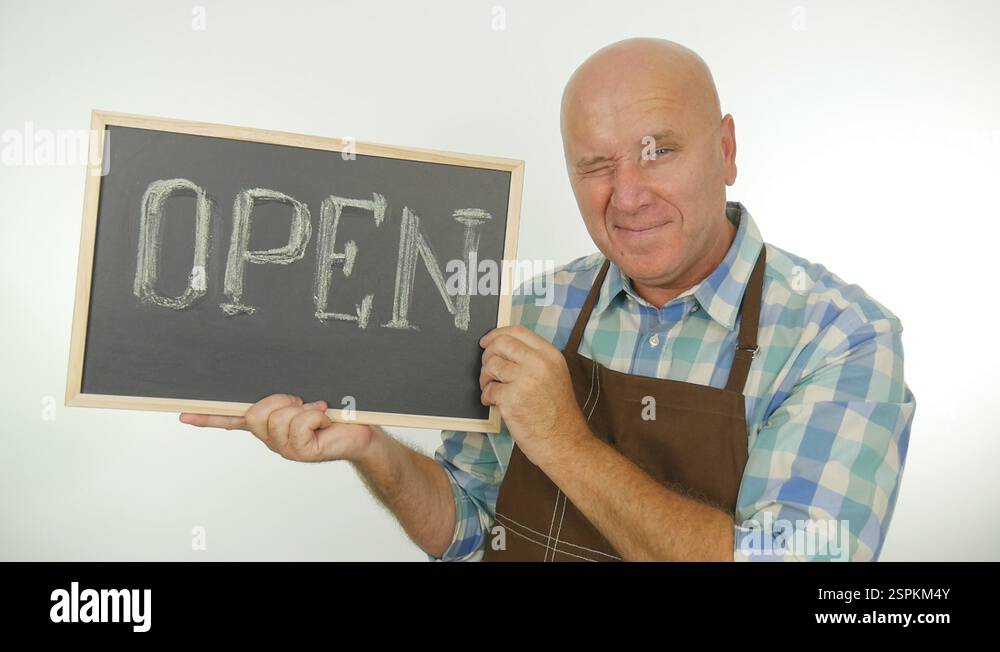 Slow Motion Happy Man Blinking and Smiling Make One Eye Sign Store Is ...