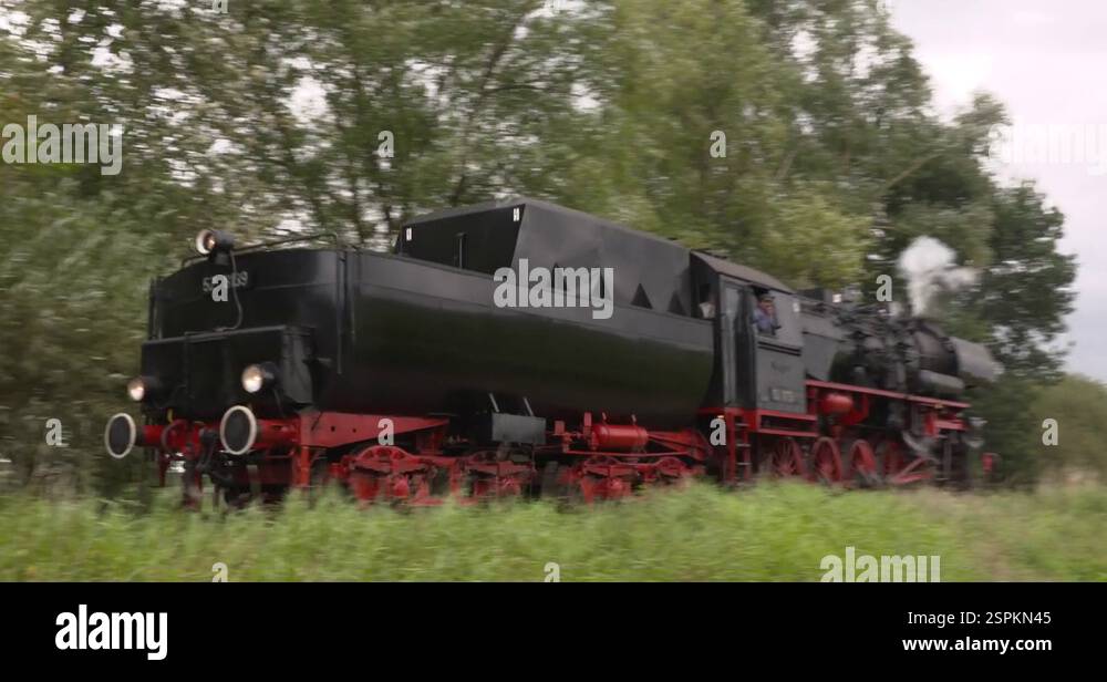 steam locomotive on track in reverse, tender-first - on camera Stock ...