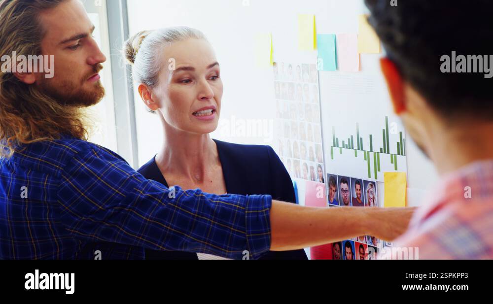 Executive discussing over document 4k Stock Video Footage - Alamy