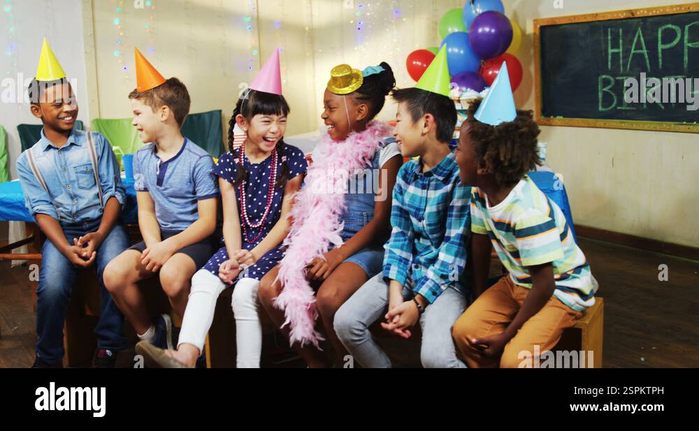 Kids smiling while sitting together during birthday party 4k Stock ...