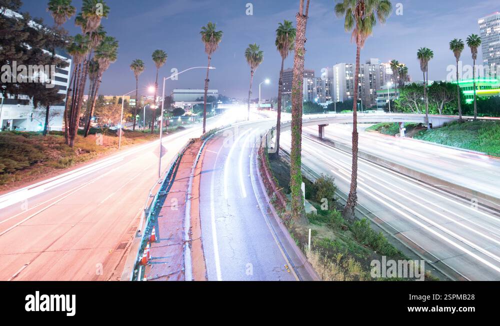6K Freeway Traffic in Los Angeles Downtown Time Lapse Palm Trees Stock ...