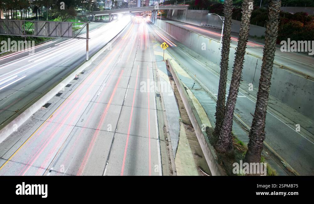 6K Freeway Traffic in Los Angeles Downtown Time Lapse Palm Trees Stock ...