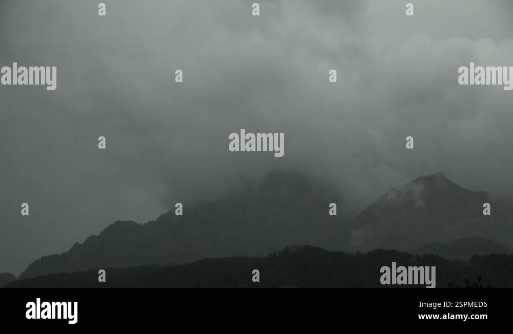 Time lapse rain thunder clouds mountain Pilatus swiss Lucerne ...