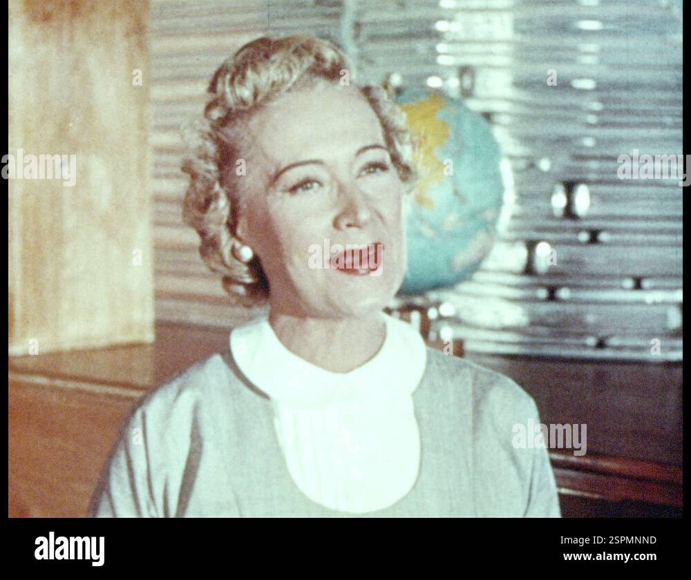 1950s: Woman smiles and talks, walks to frame, flips switches. Facts ...