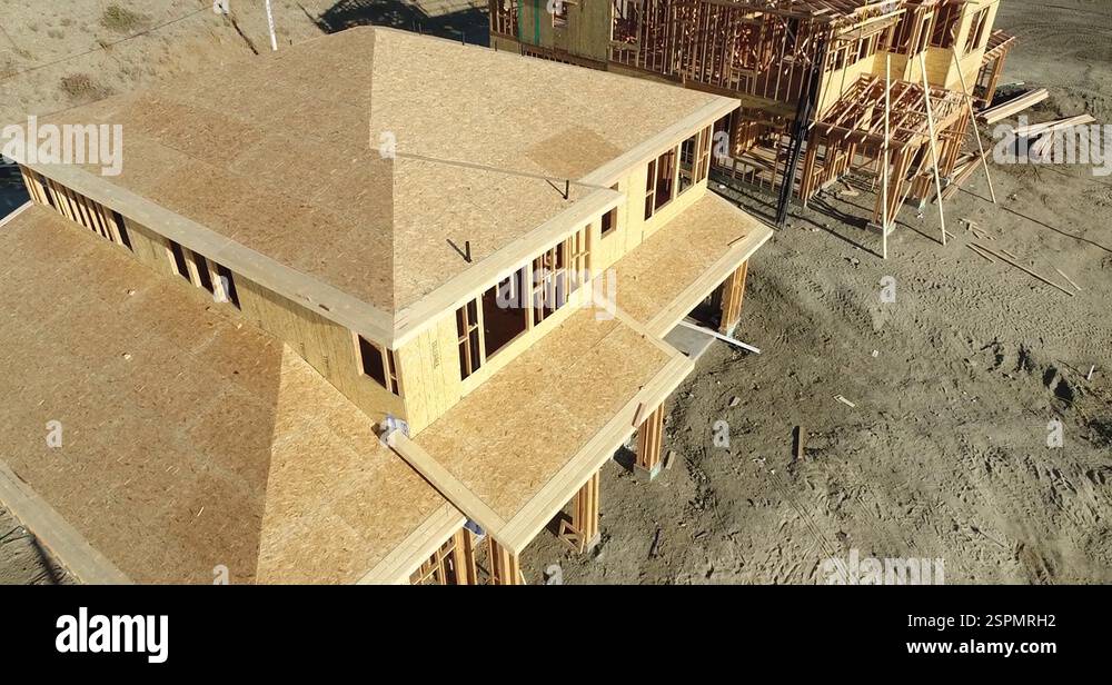 High Definition 4k Pan Down Over and Past New Home Construction Sites ...