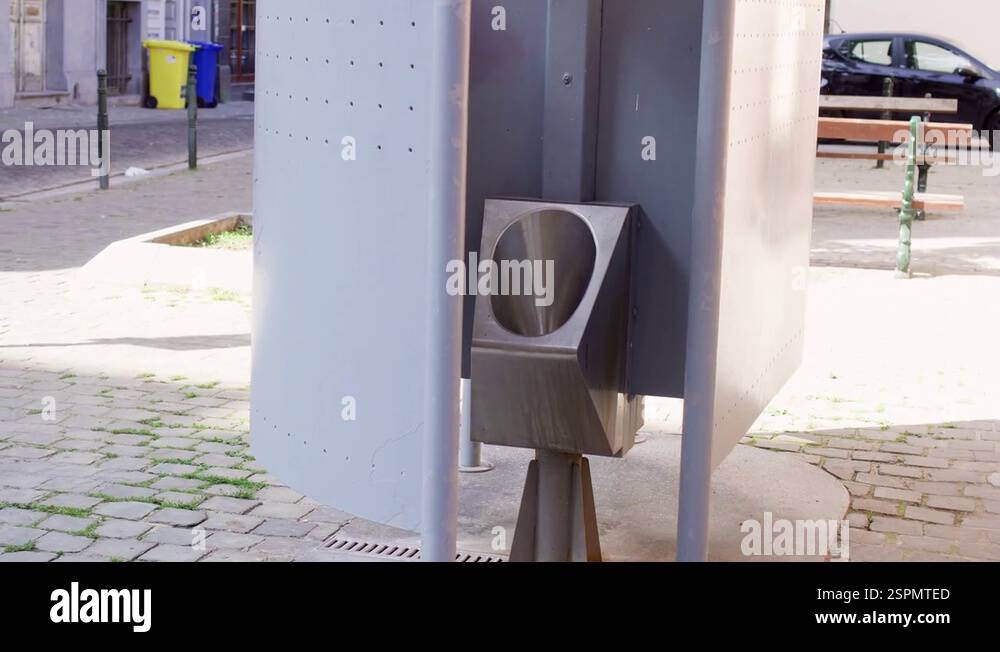 Outdoor public urinal at Brussels, Belgium. Empty pissoir standing on ...