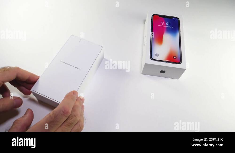 Man preparing to unbox the latest iPhone x Stock Video Footage - Alamy