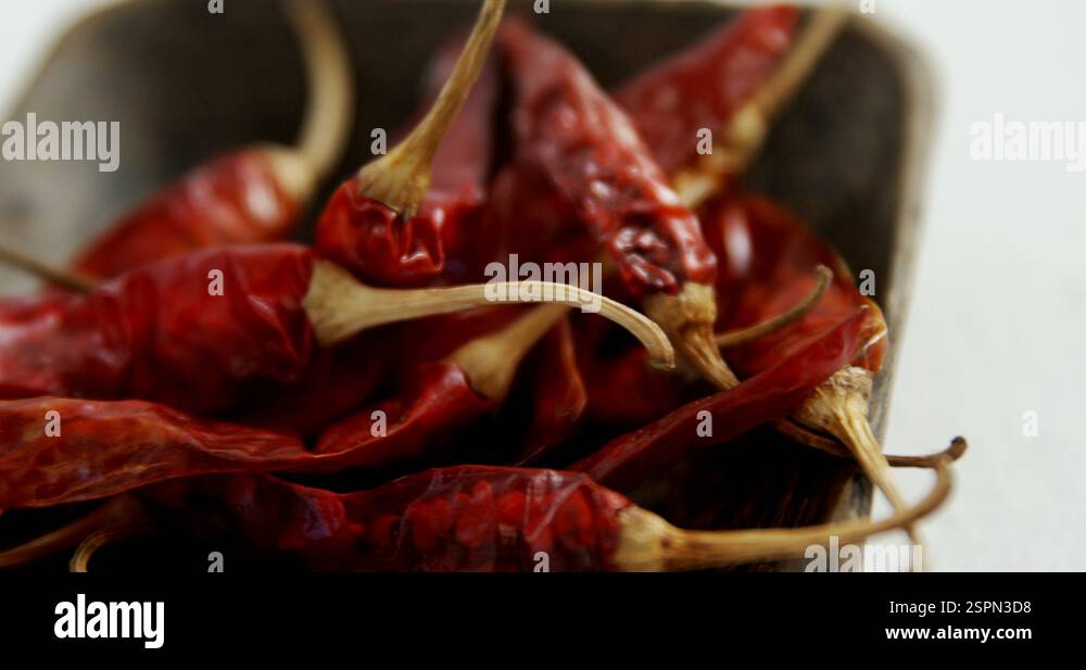 Dried red chili pepper and crushed red pepper in bowl 4k Stock Video ...