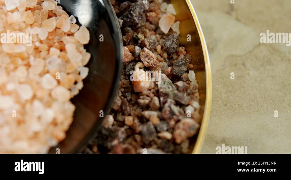 Himalayan salt and black salt in plate 4k Stock Video Footage - Alamy