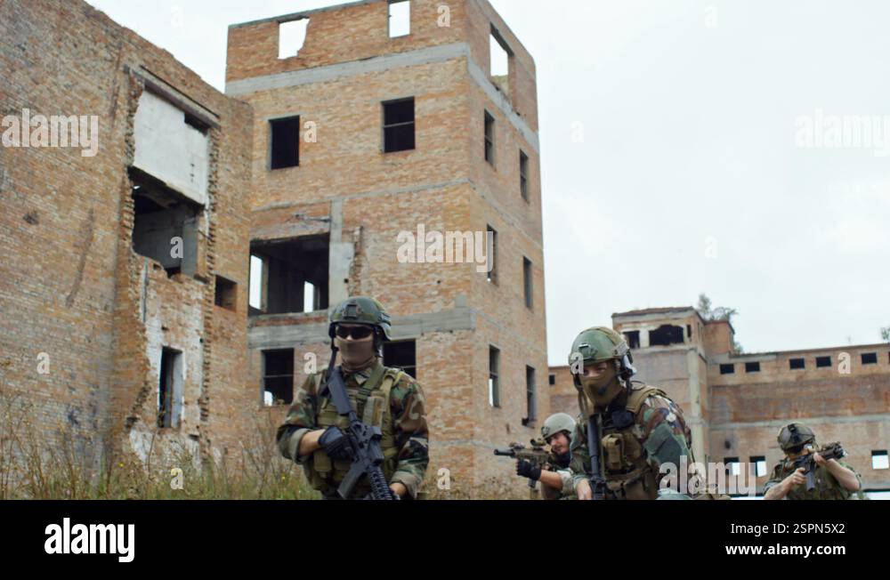 Military Armed Soldiers Running with Guns Stock Video Footage - Alamy