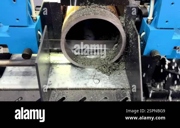 Industrial metal working cutting process The raw material bar clmaping ...