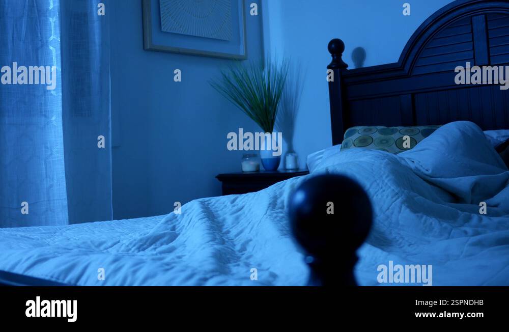 Woman sleeping peacefully in her bed under the moonlight ALT Stock ...