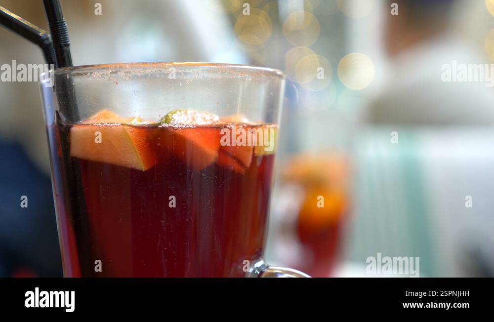 Hot red wine with fruits and spices. mulled wine. close-up 4k Stock ...