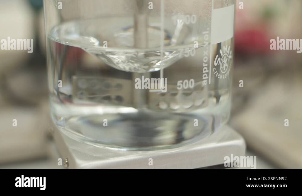 liquid being mixed in laboratory glassware slow motion Stock Video ...
