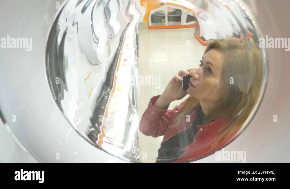 A woman buys a washing machine in a store, 4k, slow-motion Stock Video ...