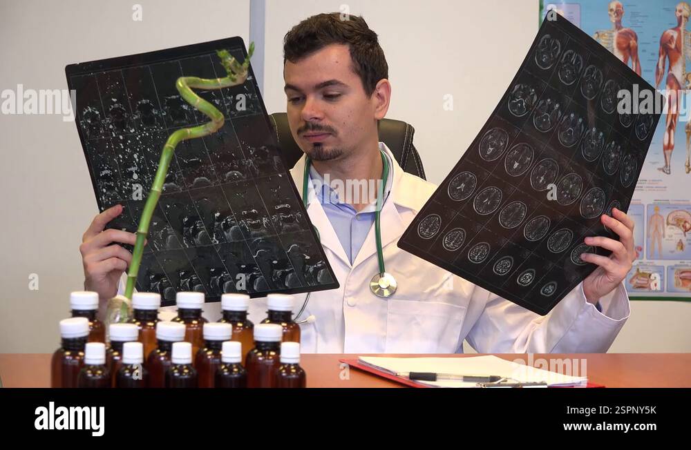 Checking looking two X ray radiography worried stressed doctor find ...