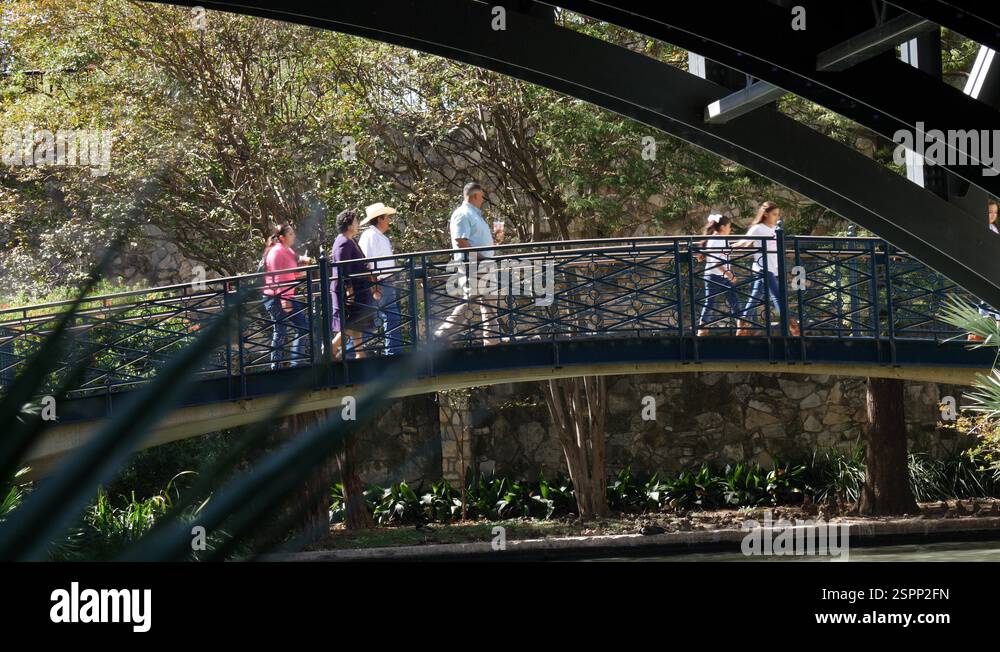San Antonio Oct 2017 Pedestrians Walking Over Bridge River Walk Stock ...