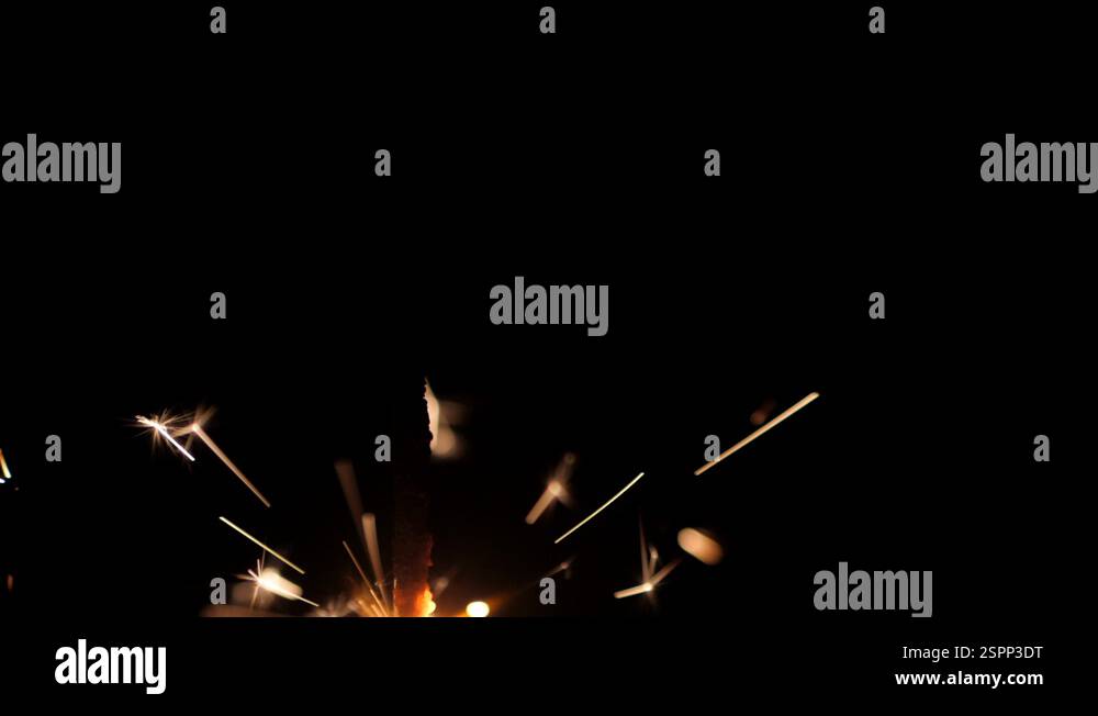 Sparkler Over Black. Gun powder sparks shot against deep dark ...
