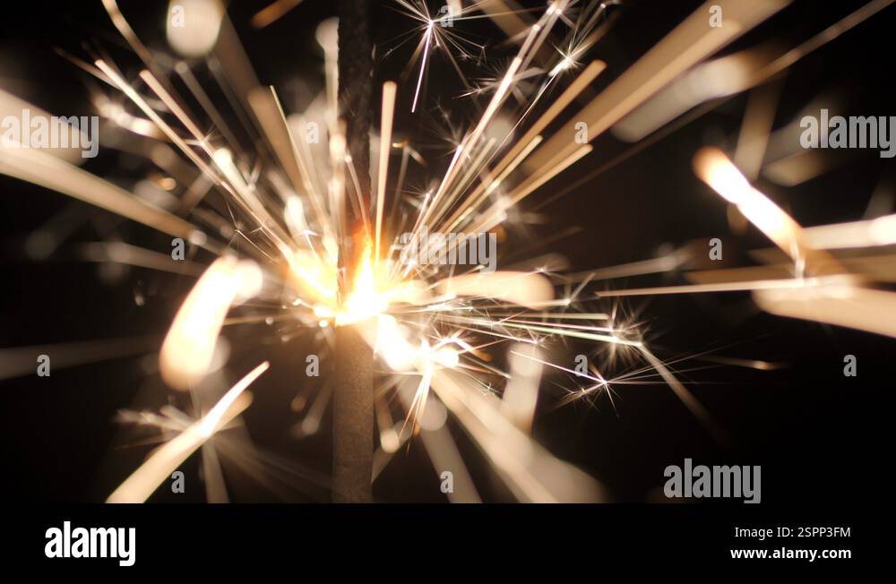 Sparkler Over Black. Gun powder sparks shot against deep dark ...