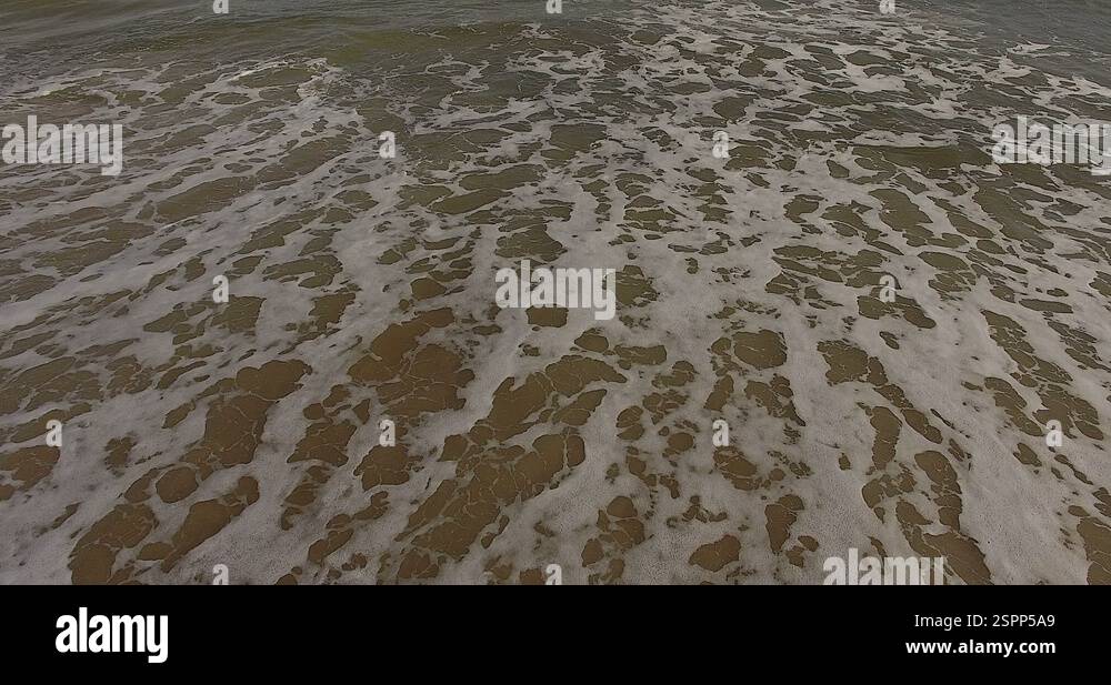 Low Aerial of the Atlantic Shoreline surging surf Stock Video Footage ...