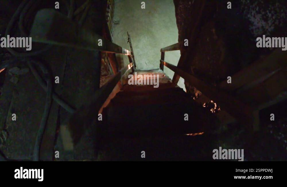 Slow motion shot of creepy basement stairs. Ghost story, horror ...