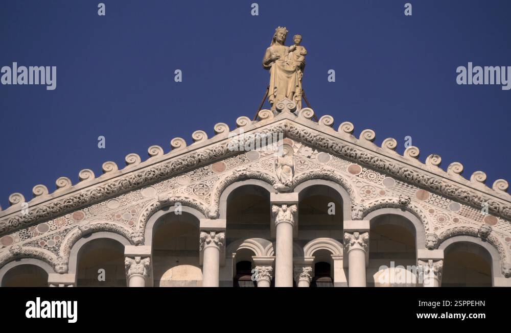 Zoom out from The Romanesque facade of the Pisa Cathedral, Duomo di ...
