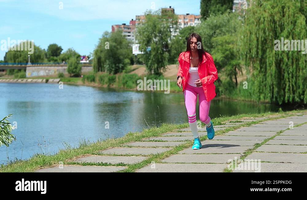 Sportswoman note down time in watch and start runs Stock Video Footage ...