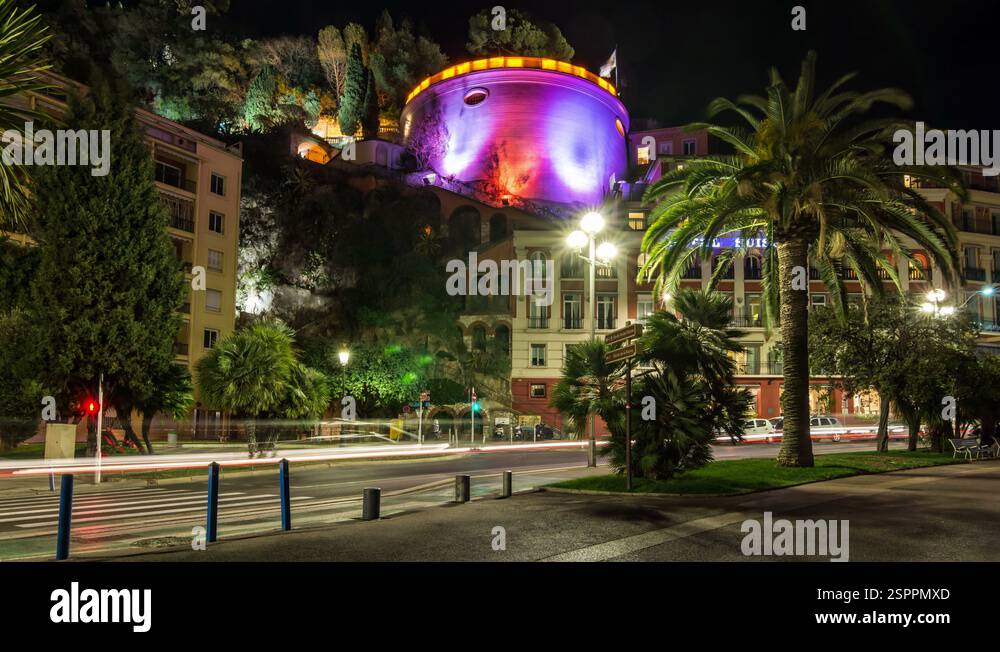 Illuminated castle of Nice, France. City lights. Car traffic. Light ...