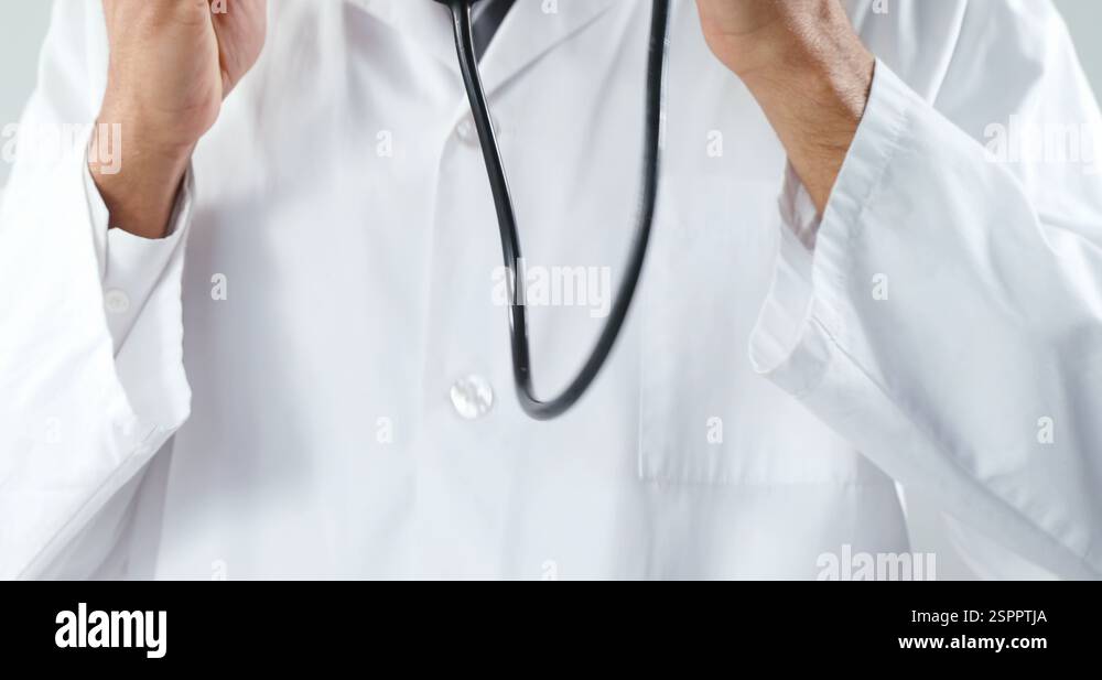Doctor showing his stethoscope against white background 4K 4k Stock ...