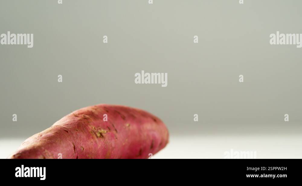 Sweet potato placed on white background 4k Stock Video Footage - Alamy
