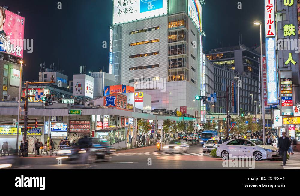 Night timelapse tourist walking at Shinjuku Station, Tokyo, Japan 4K ...