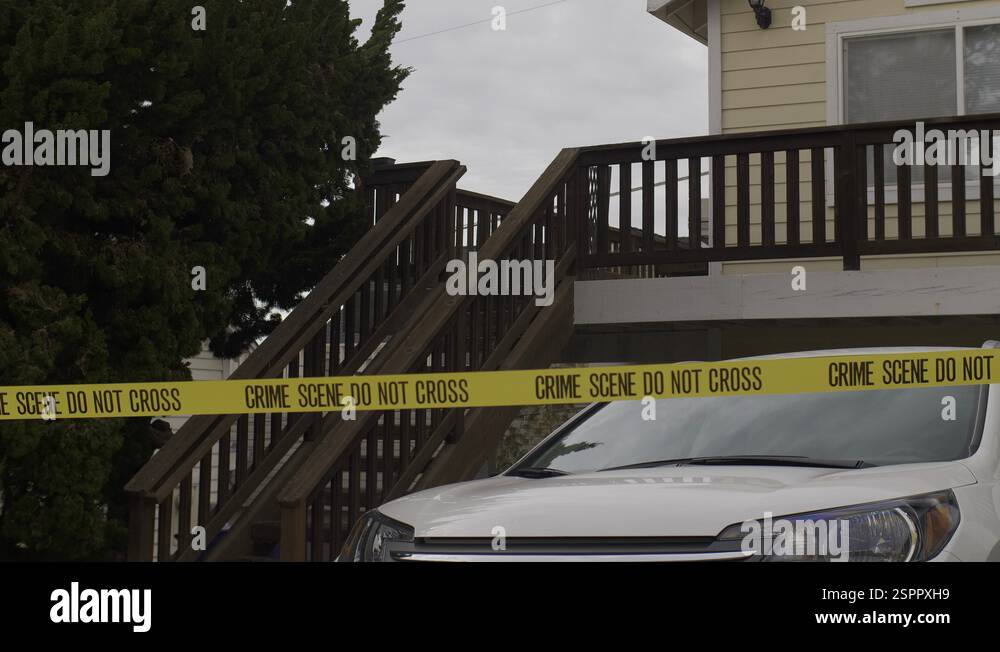 RESIDENTIAL CRIME SCENE, IN 4K. Upstairs guest house exterior Stock ...