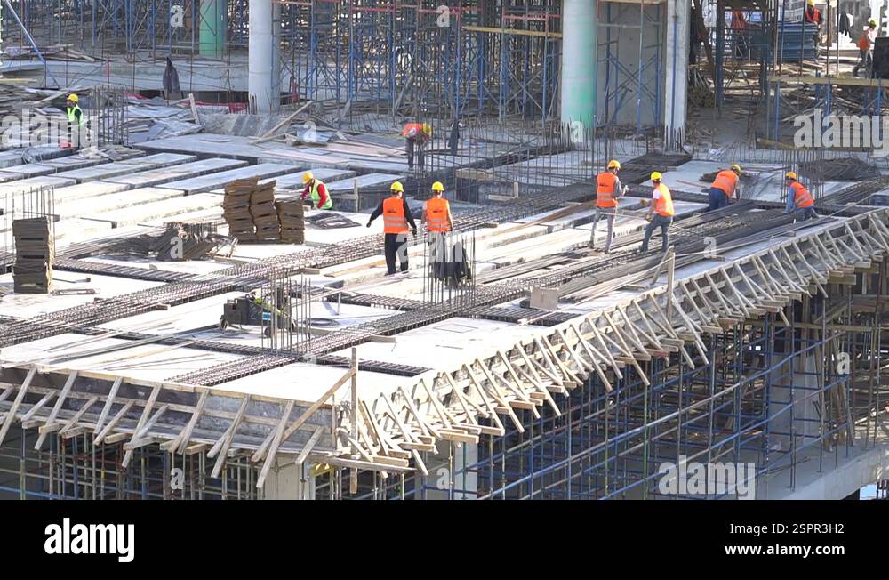Construction workers working on building. Time lapse Stock Video ...