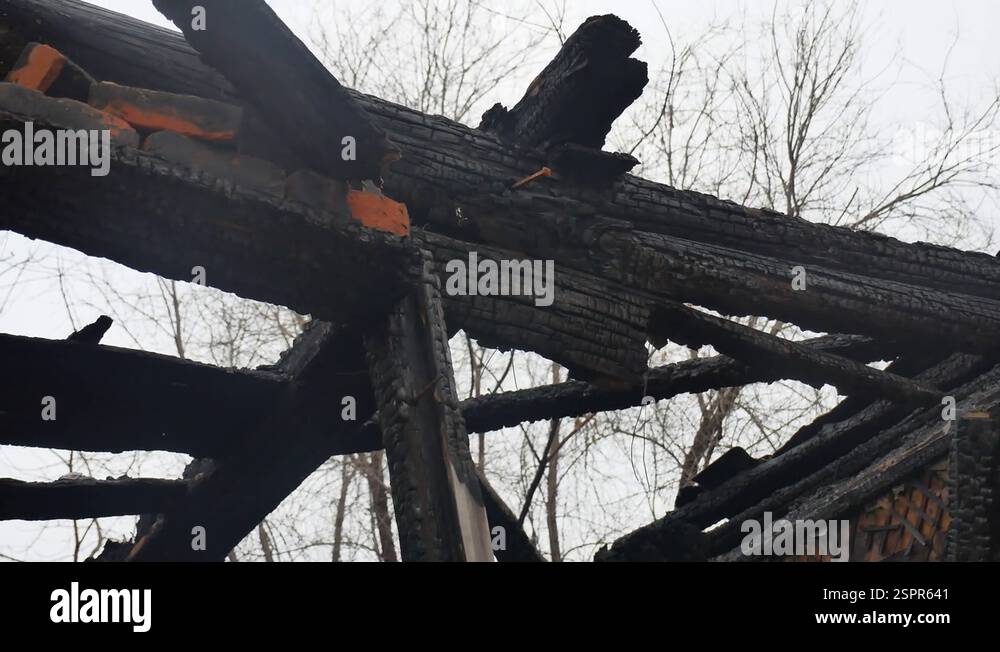 interior old burnt of burned-down wooden fire house after Stock Video ...