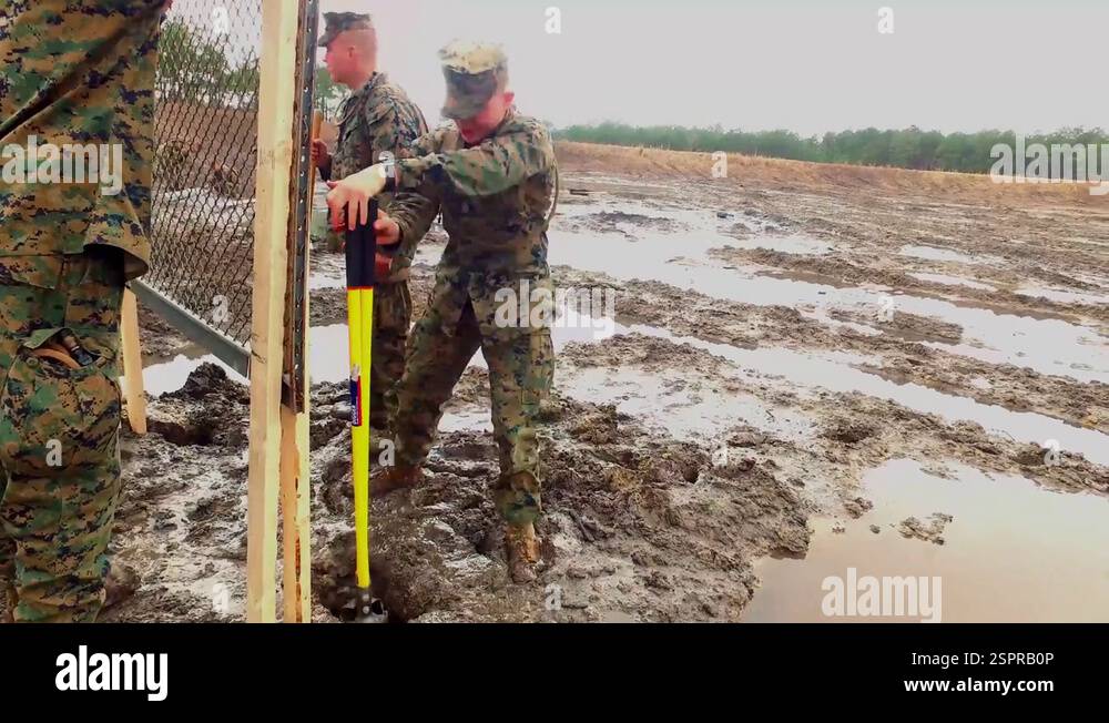 Marine digging hole for explosives Stock Video Footage - Alamy