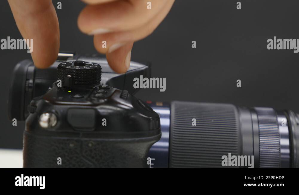 turning the settings wheel on photo camera Stock Video Footage - Alamy